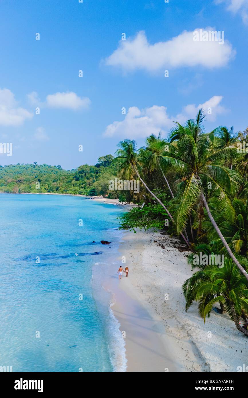 Experience the breathtaking view of Koh Kood Islands serene beach in Thailand, with crystal ...