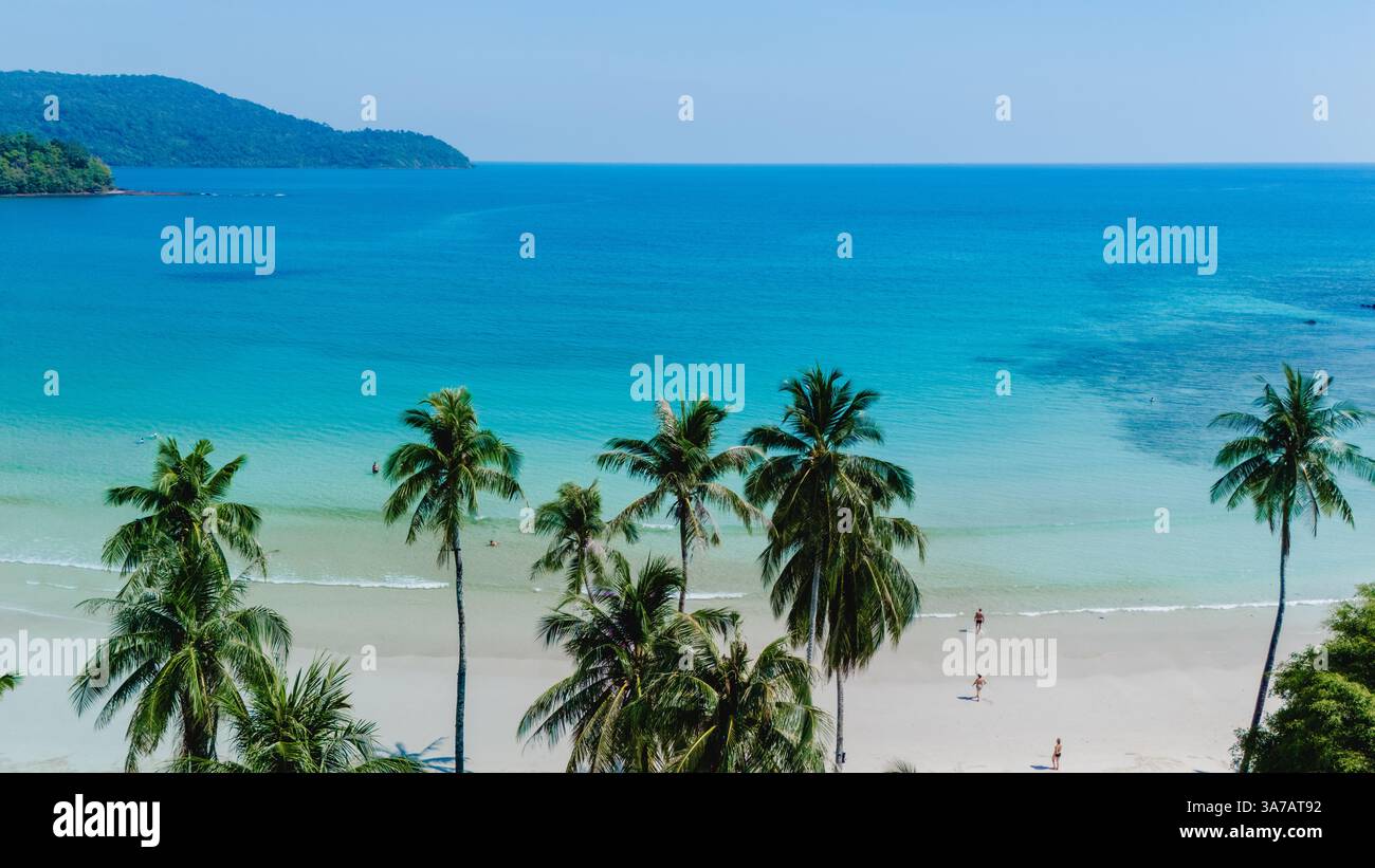 Aerial shots showcase the serene beaches and vibrant, crystal-clear turquoise waters of Koh Kood ...