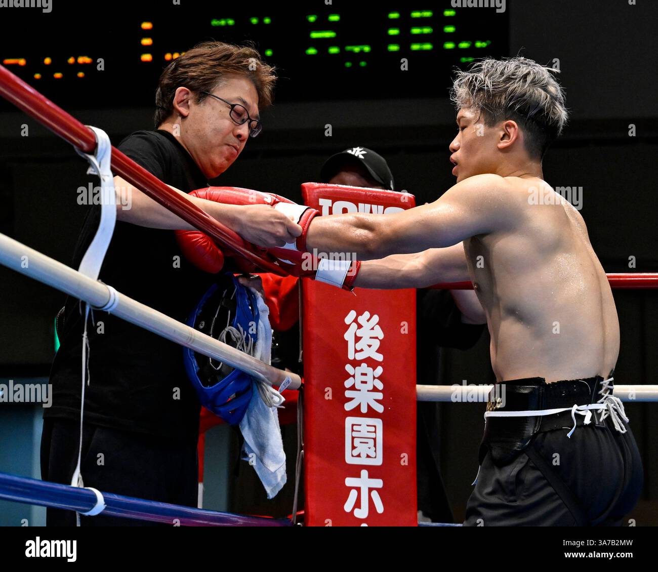 Reito Tsutsumi (R) and his father Naoki Tsutsumi during the test to be ...