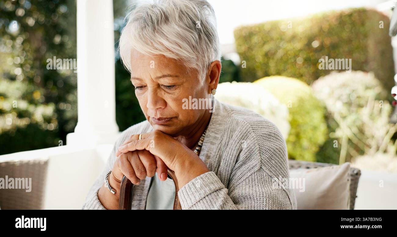 Thinking, sad and senior woman at house with memory, nostalgia and past reflection. Elderly ...