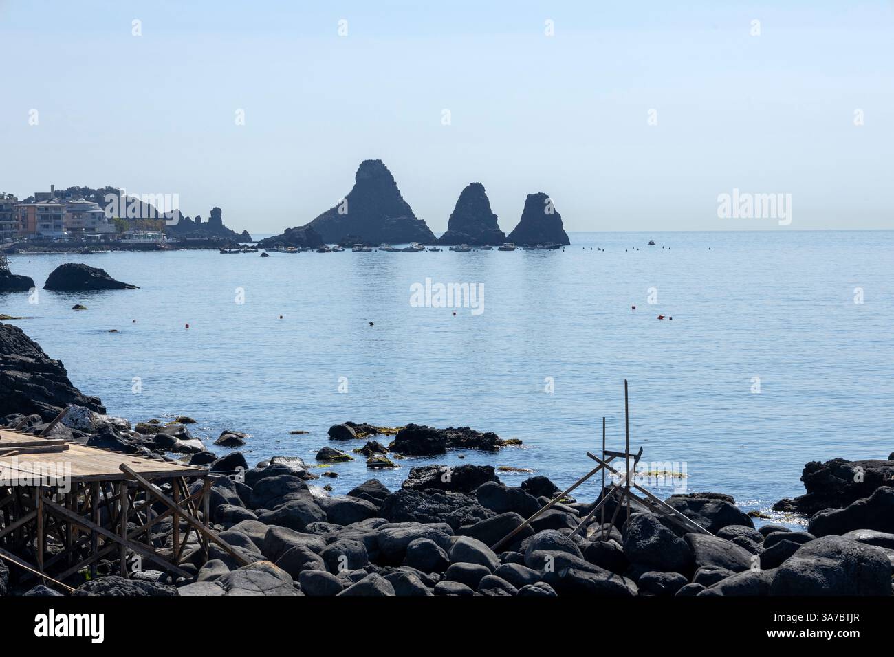 The famous stacks of Aci Trezza, province of Catania, Sicily, Italy ...