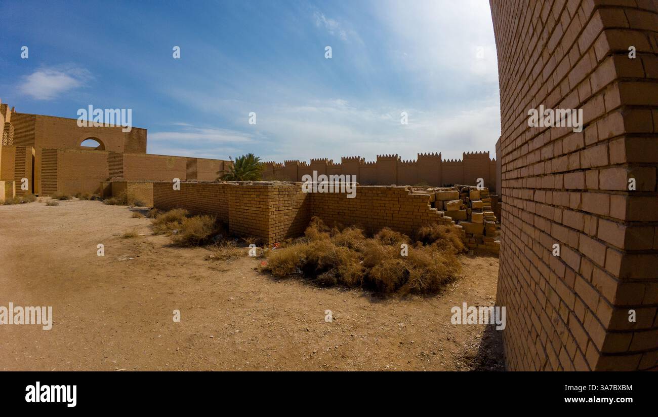 Ancient brick walls and ruins under a blue sky, with scattered ...