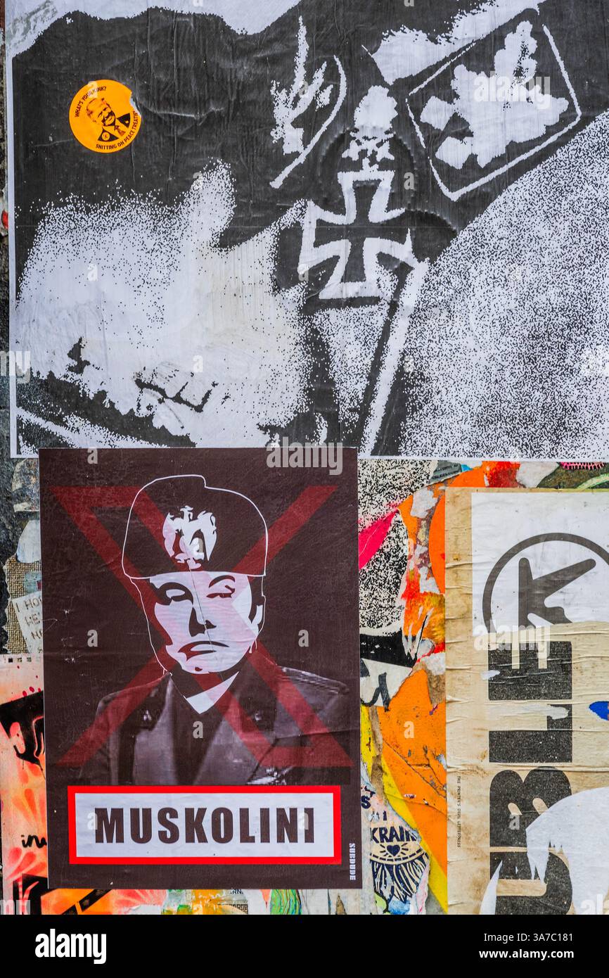 London, UK. 26th Mar, 2025. Posters and graffiti depicting caricatures ...