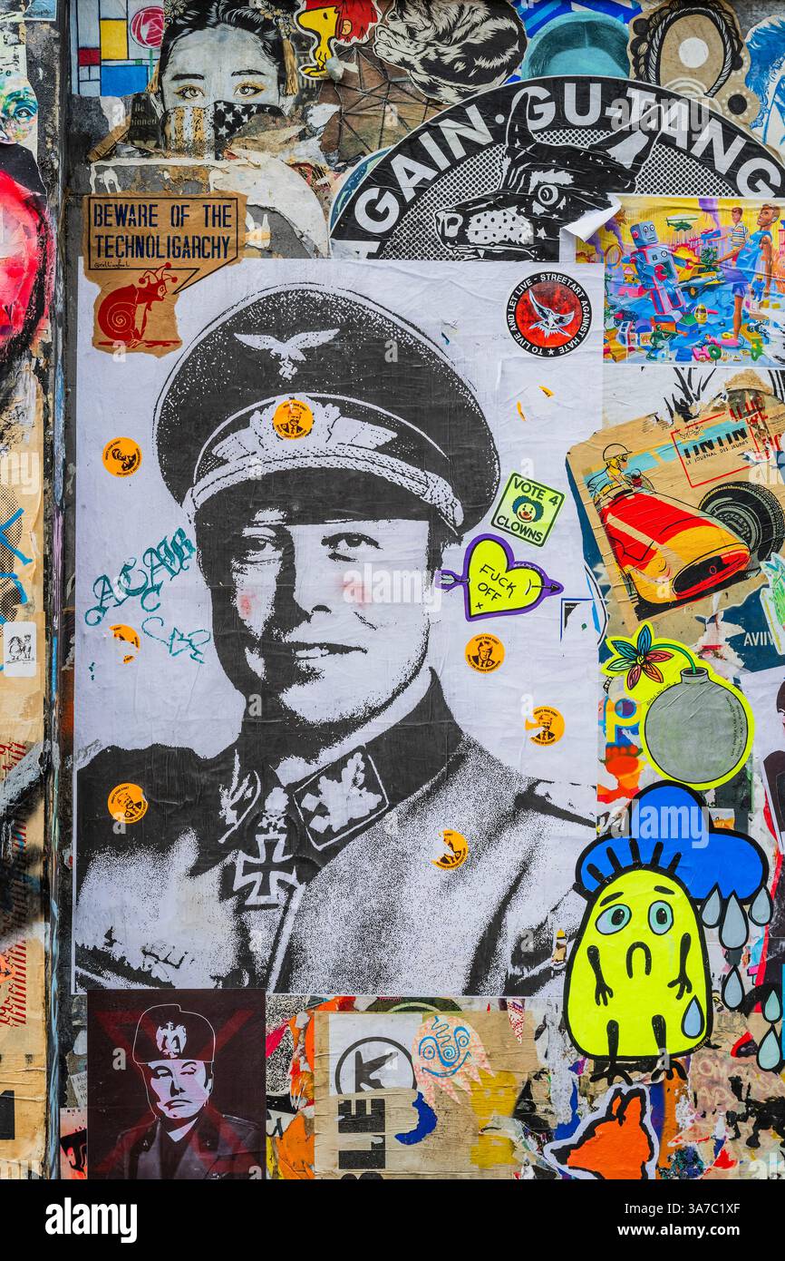 London, UK. 26th Mar, 2025. Posters and graffiti depicting caricatures ...