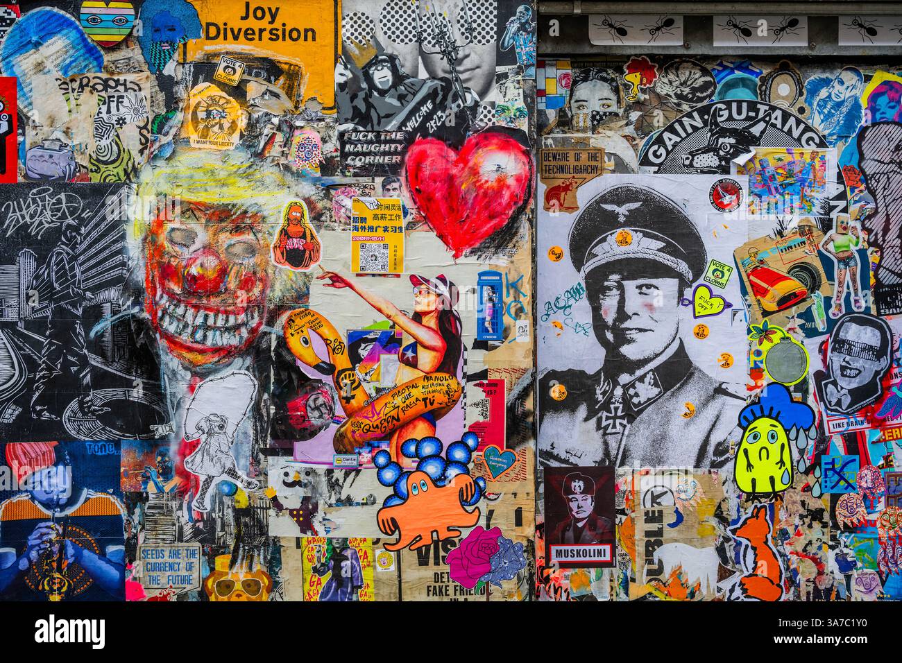 London, UK. 26th Mar, 2025. Posters and graffiti depicting caricature ...