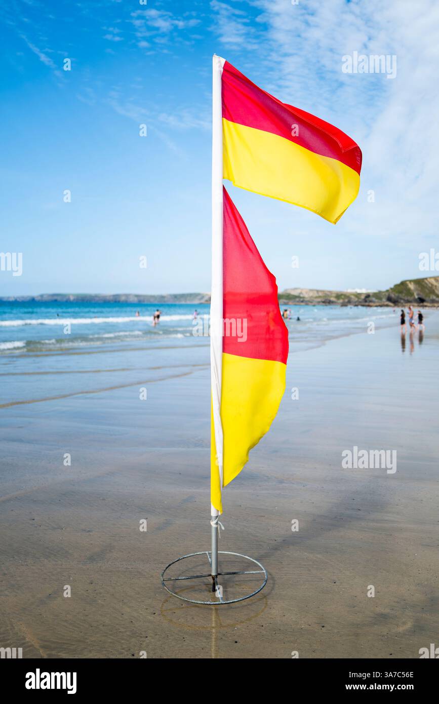 A red and yellow safety flag indicating the safe swimming area on Gt ...