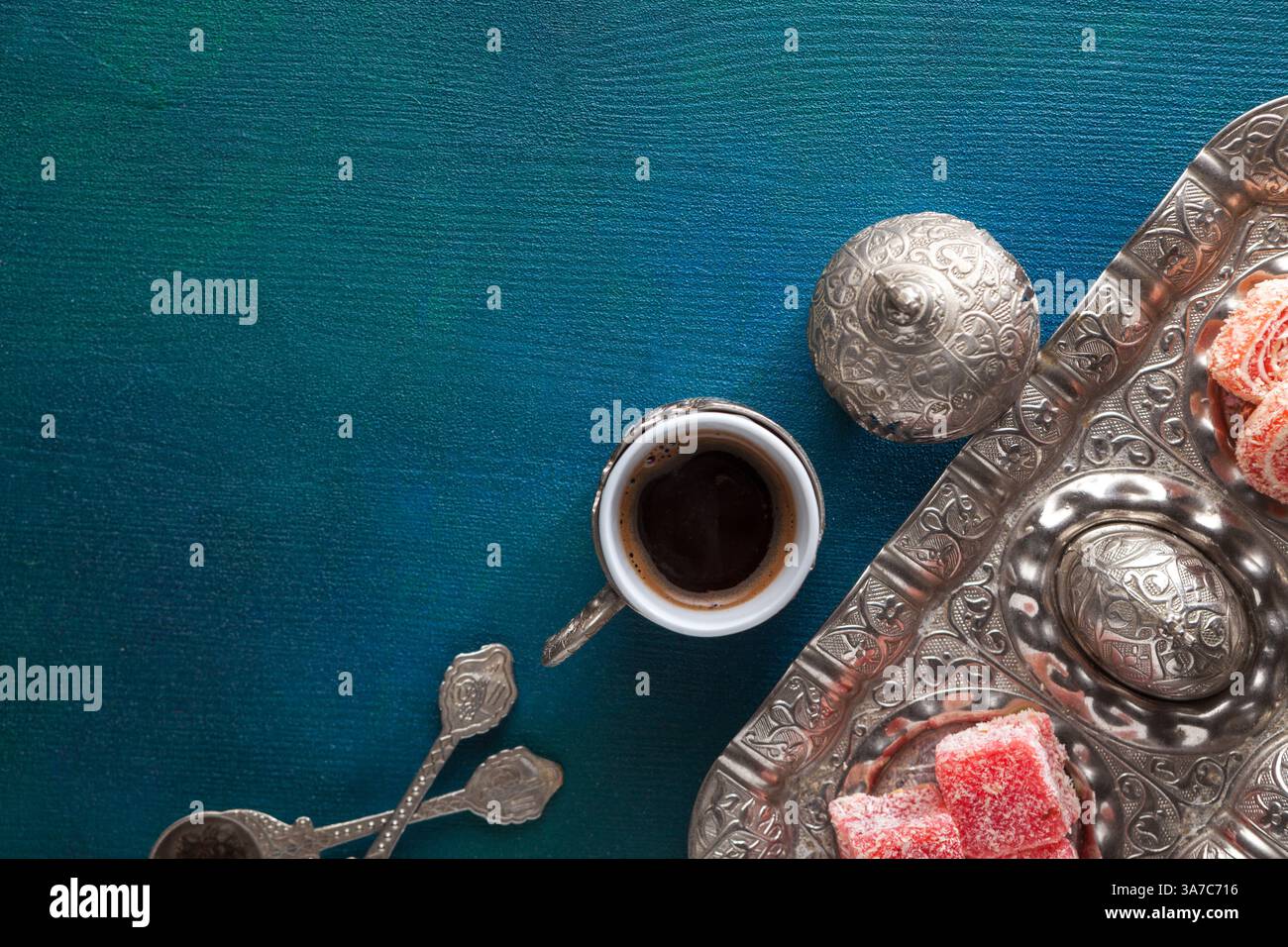 Traditional turkish coffee and turkish delight on wooden table painted ...