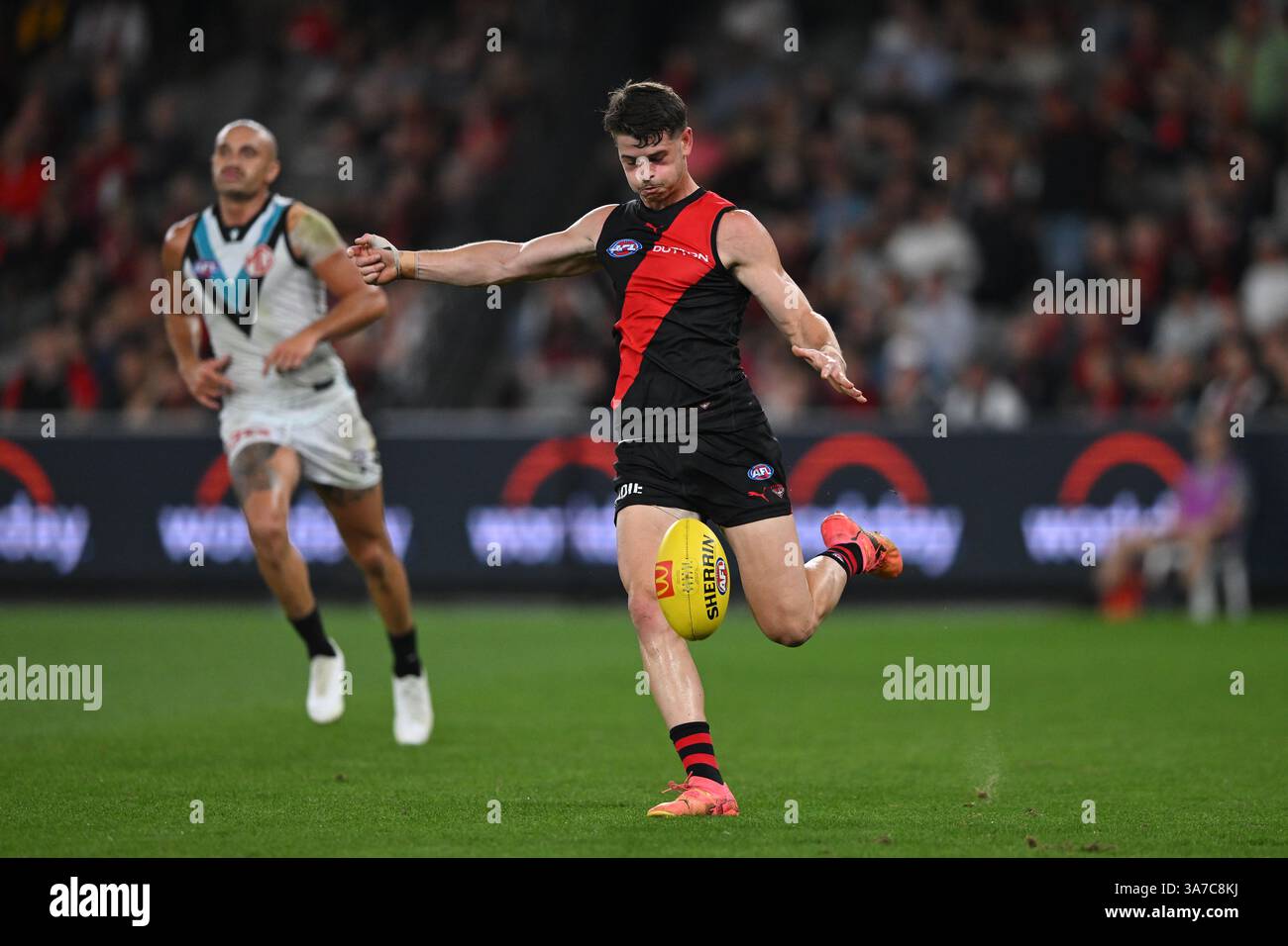 Jason Prior of Essendon kicks the footy during the AFL Round 3 match ...