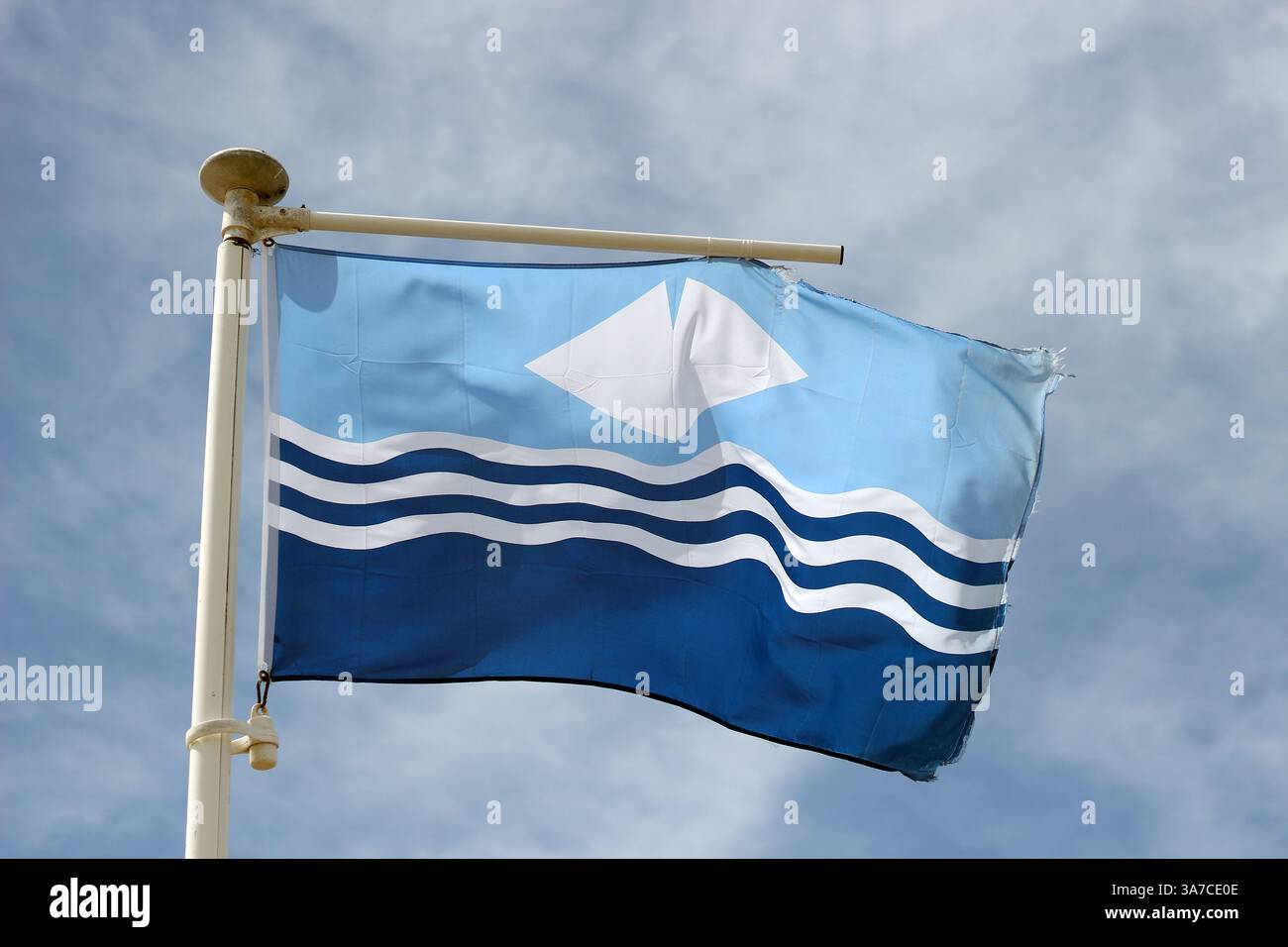 Flag of the Isle of Wight flying againt blue sky Stock Photo - Alamy