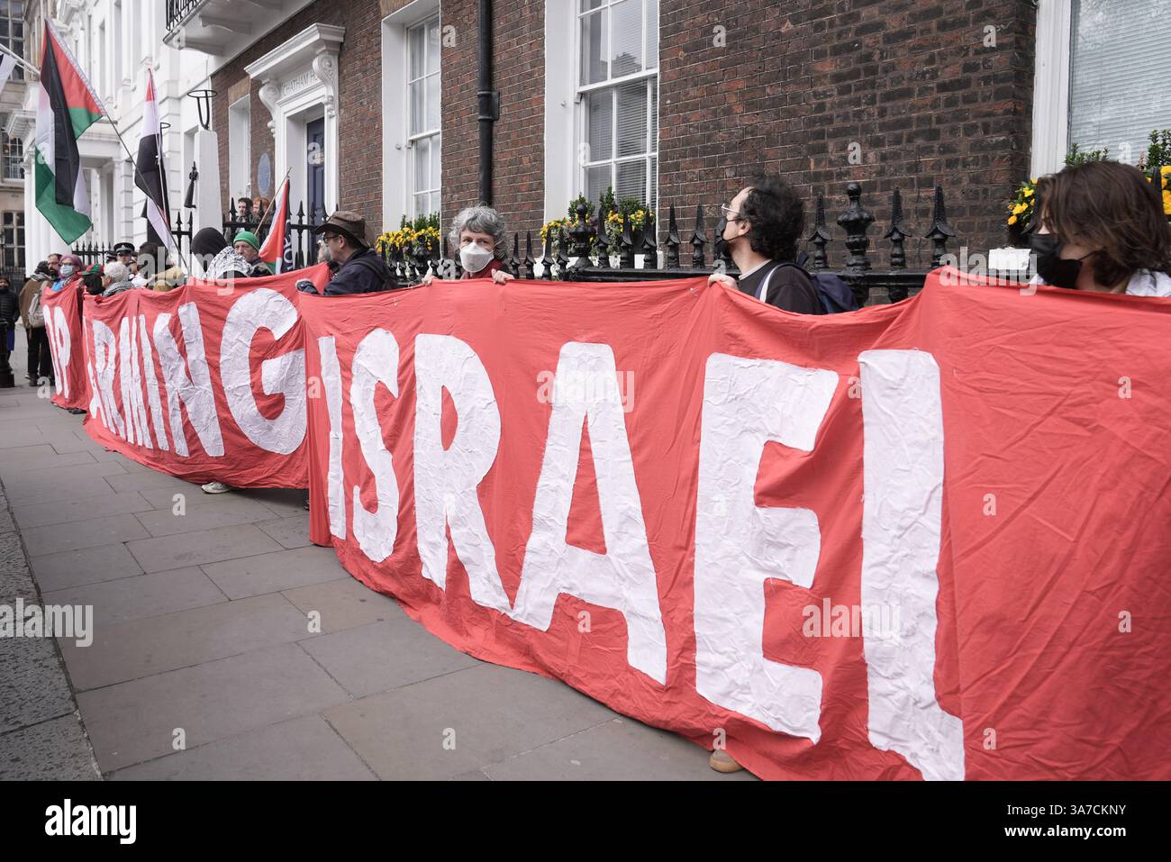 People take part in a demonstration ahead of Business Secretary ...