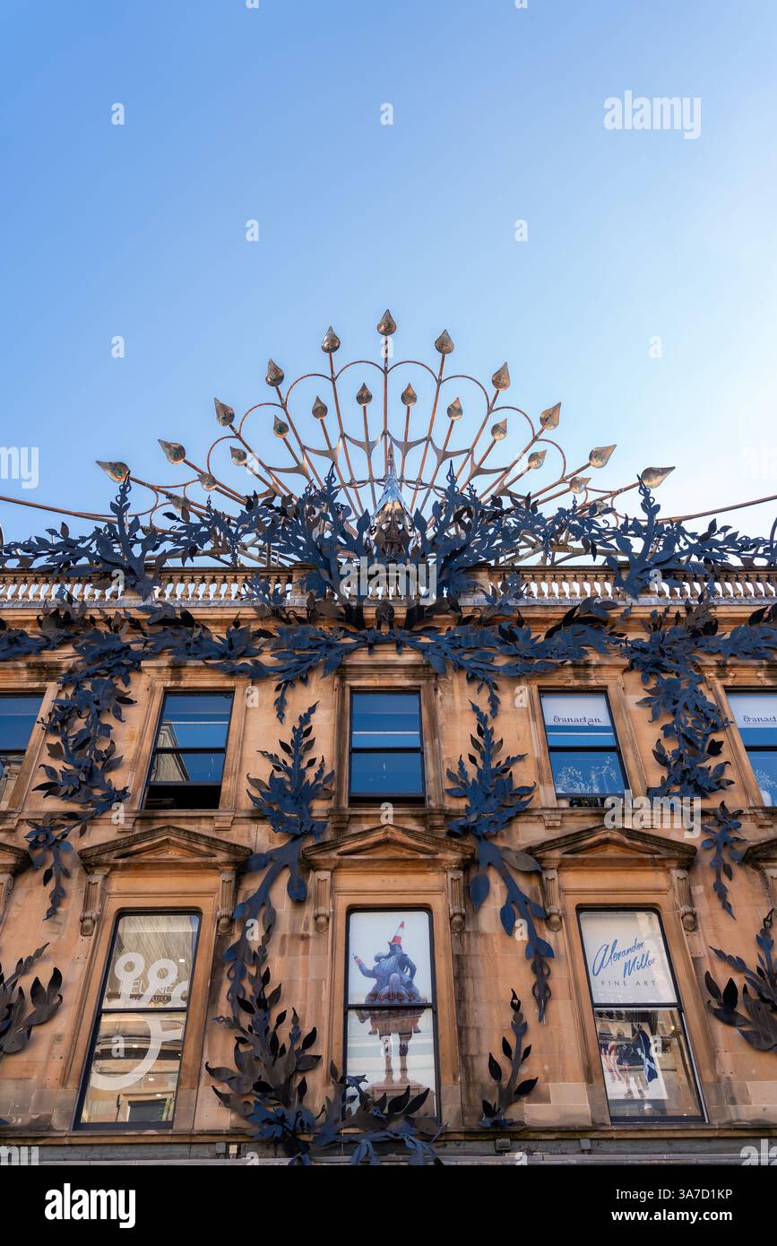 Unique artistic ironwork in the form of a peacock crown decorates a ...