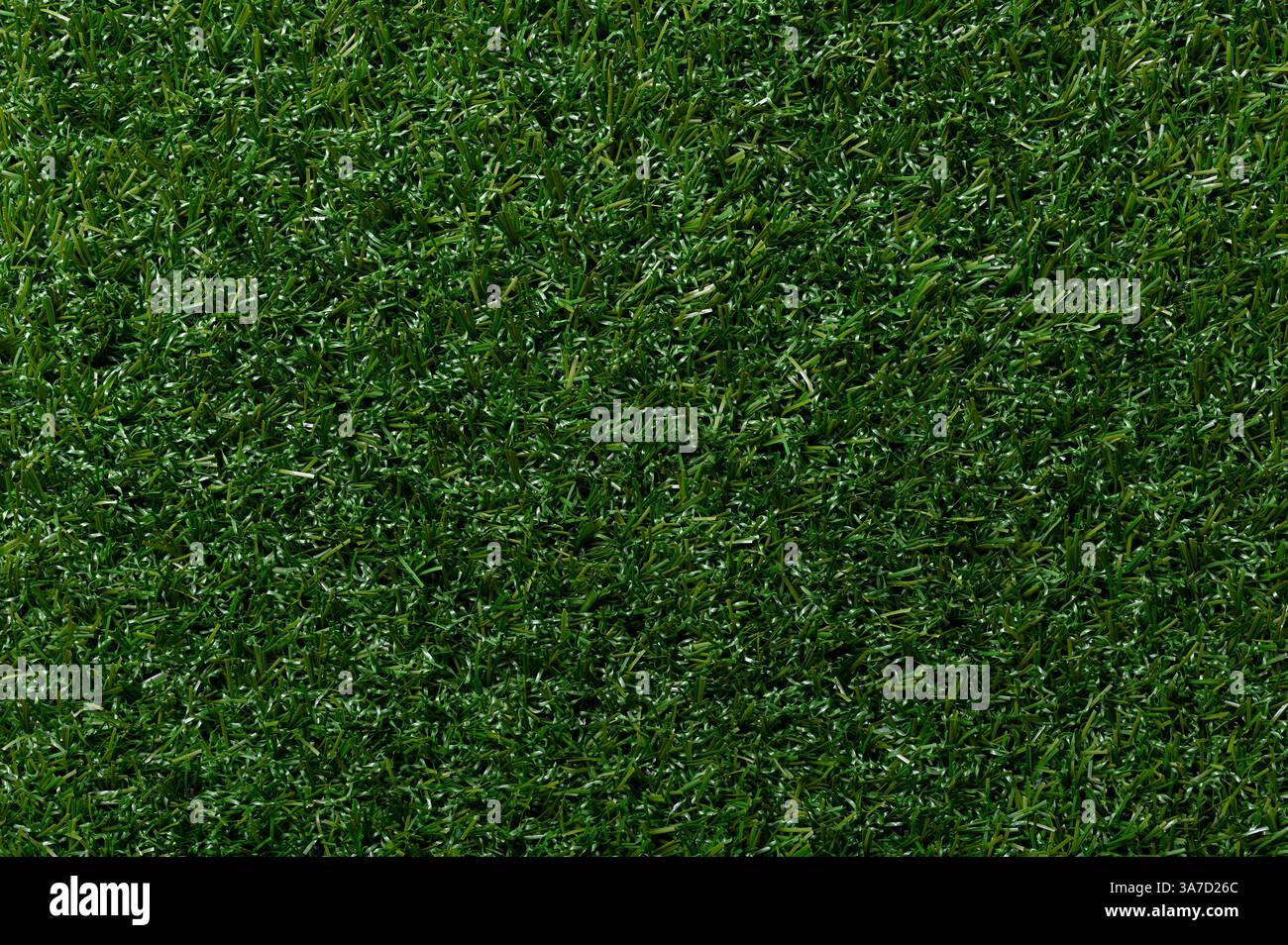 Artificial turf, plastic grass, surface and background. Green colored ...