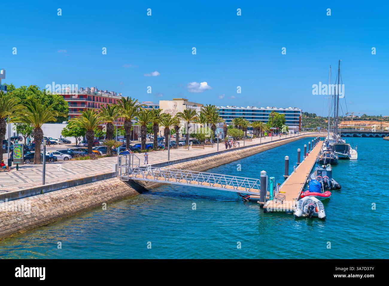 Quayside and jetty Lagos Marina, The Algarve, Portugal with boats and ...