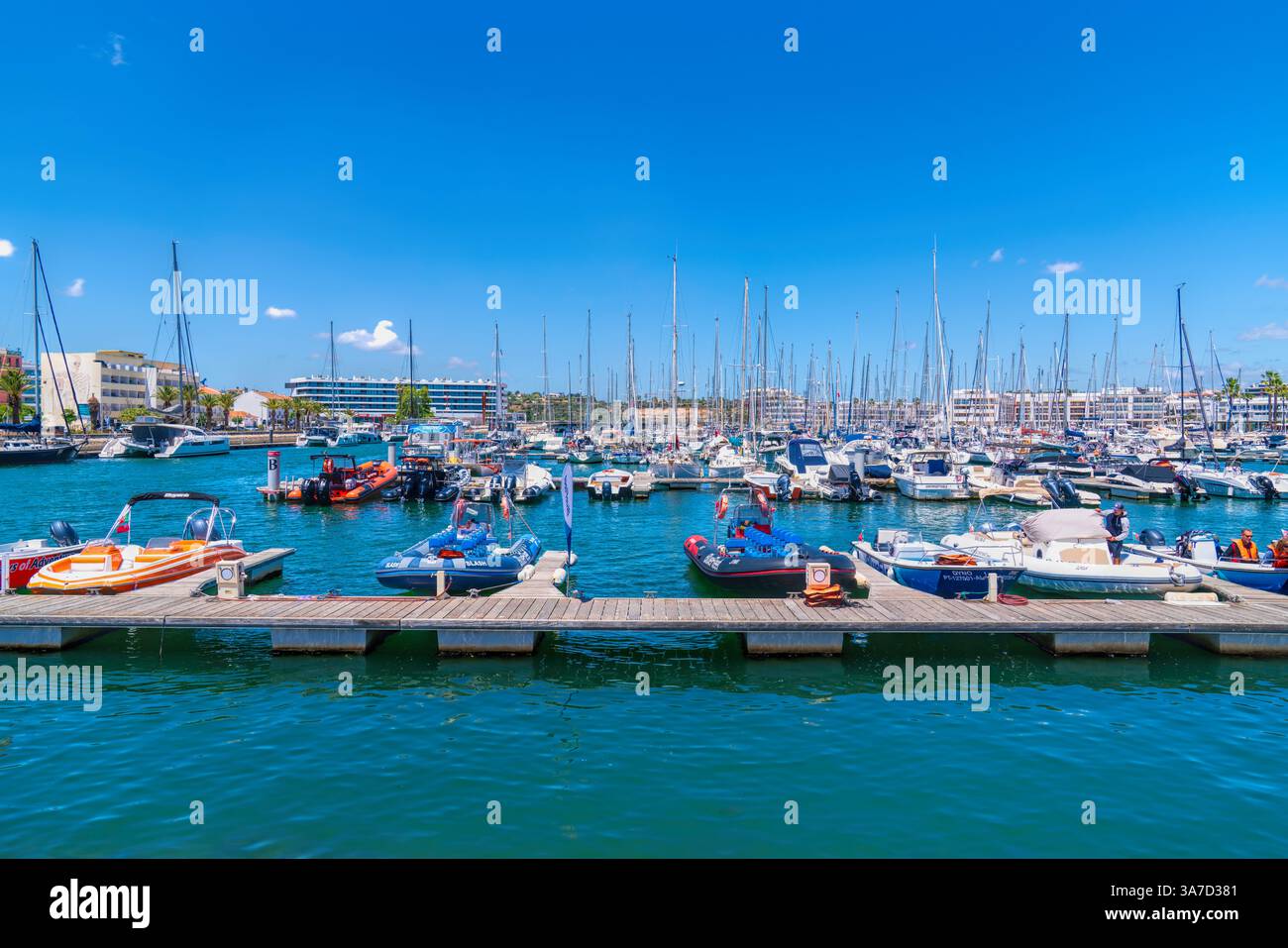 Quayside and jetty Lagos Marina, The Algarve, Portugal with boats and ...