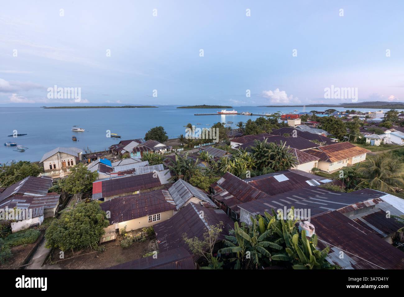 Panoramic early morning view of Daruba town, harbor, and nearby islands on Morotai Island, North ...