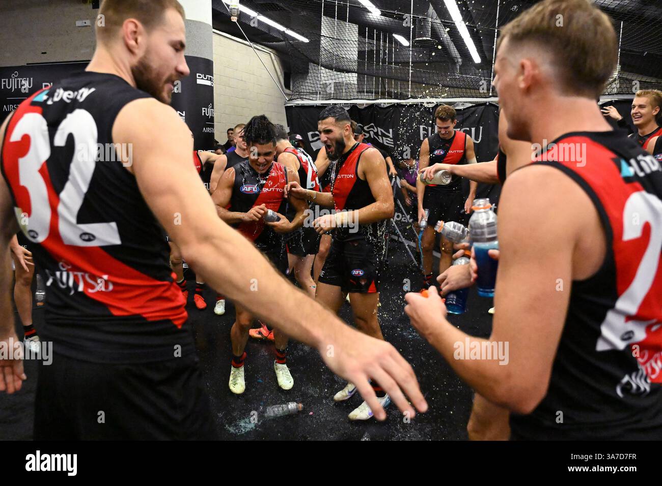 Saad El-Hawli of Essendon celebrates in the rooms after defeating Port ...