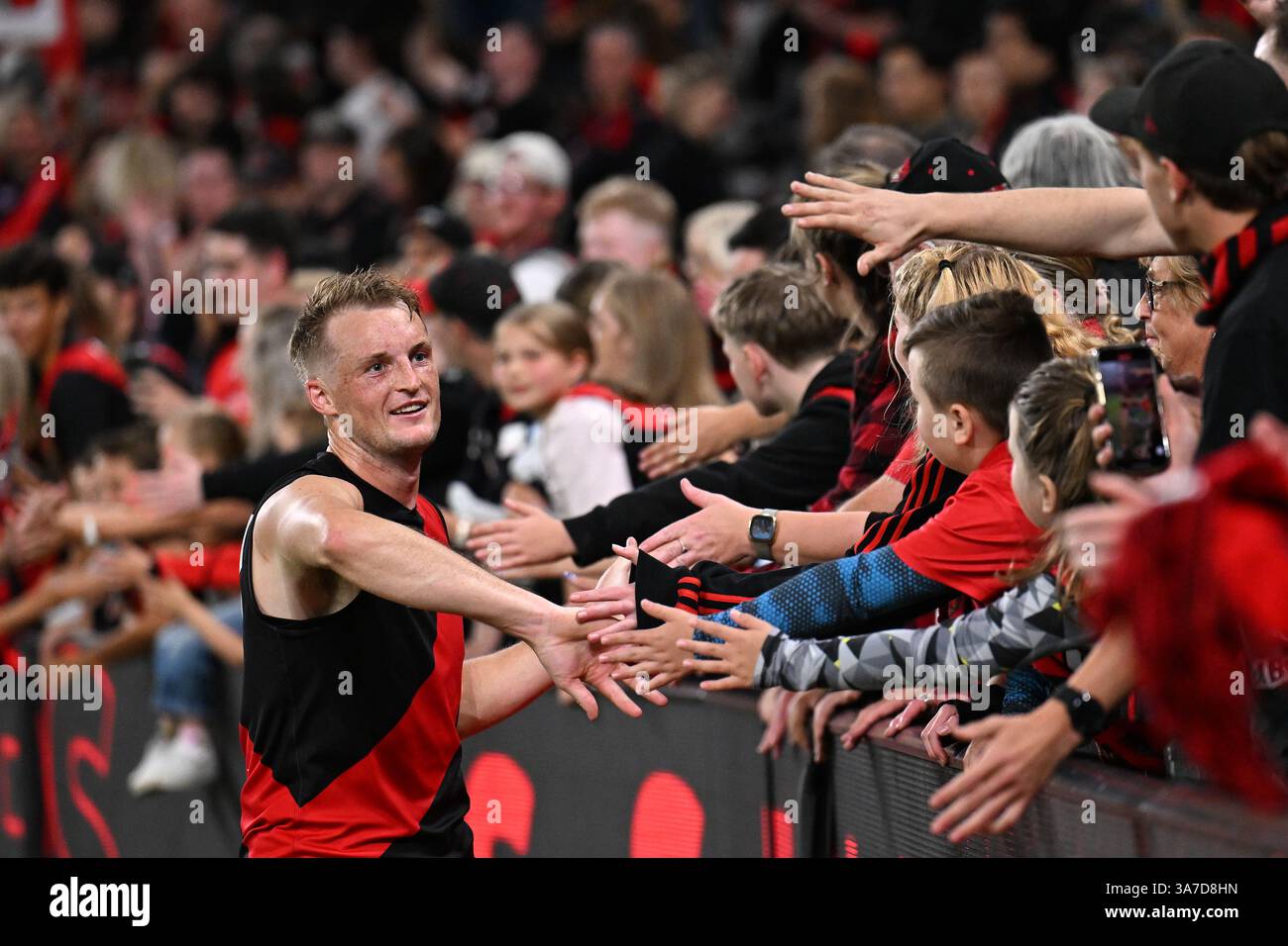 Mason Redman of Essendon with fans after defeating Port Adelaide in the ...