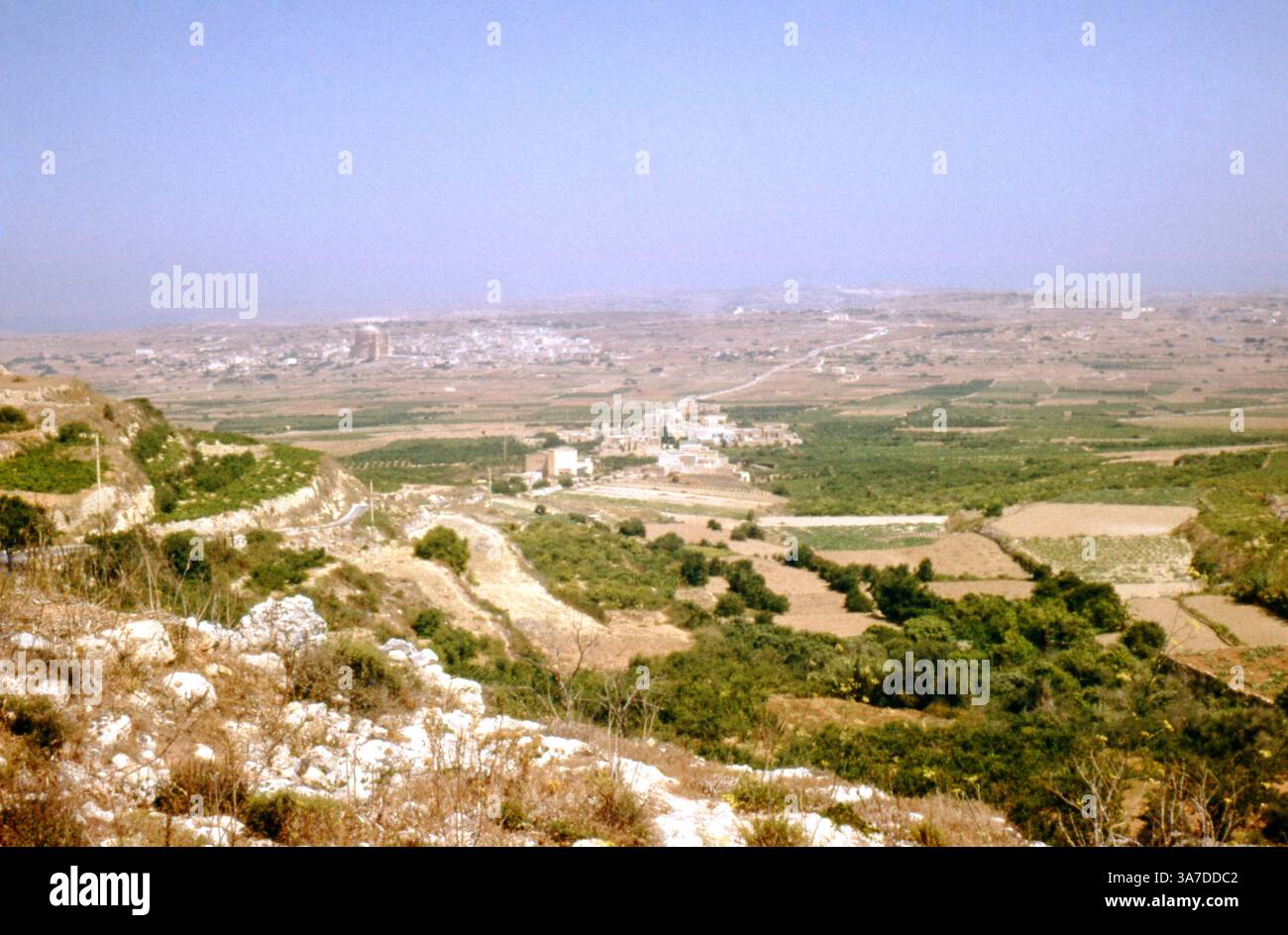 A view across the rural landscape toward Mosta, Malta, with its famous ...