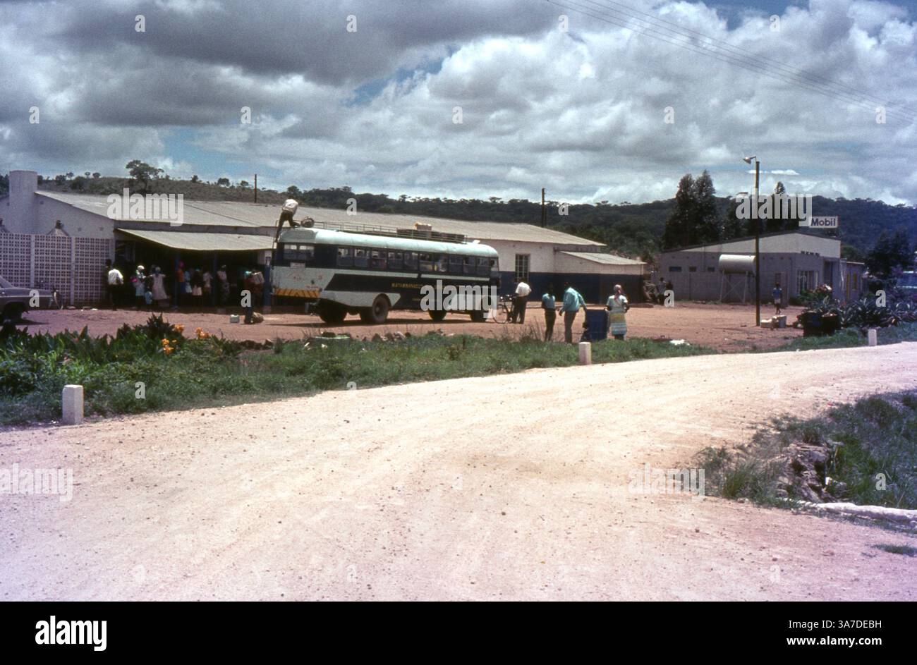A roadside stop in 1970s Rhodesia (now Zimbabwe), featuring a ...