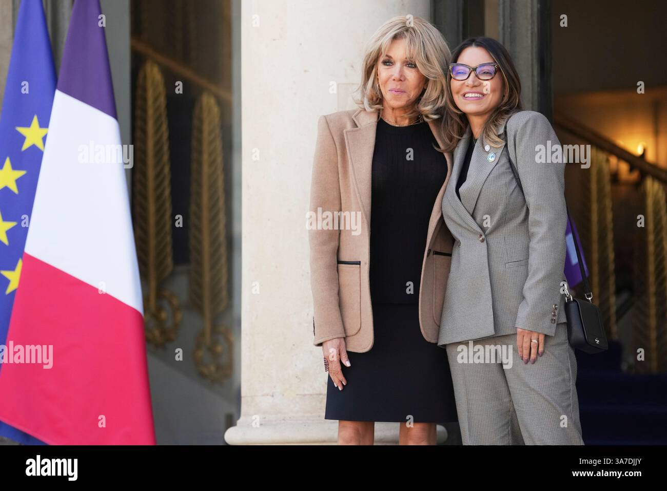 French first lady Brigitte Macron, left, poses with Brazil's first lady ...