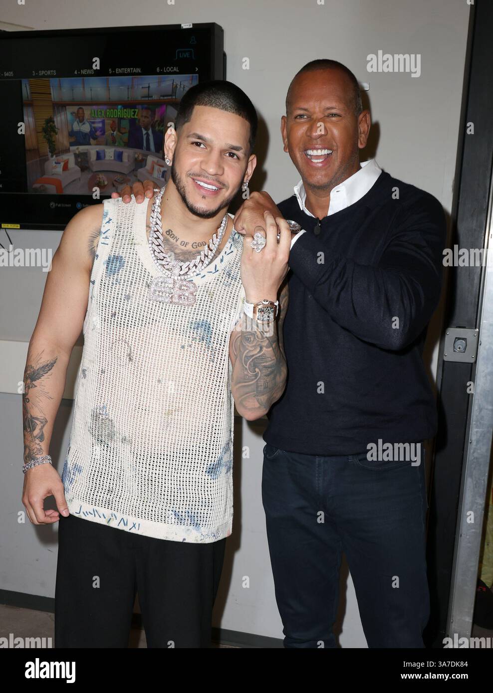 DORAL FL-MARCH 27: Boxer Edgar Berlanga and Alex Rodriguez are seen ...