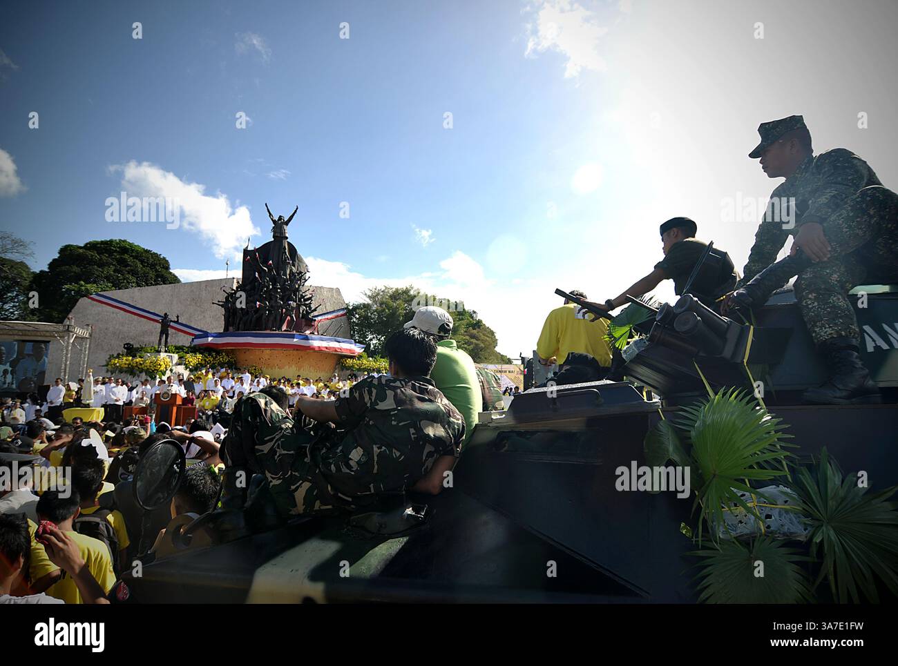 Feb. 25, 2013 - Manila, Philippines - Soldiers rest atop a tank as ...