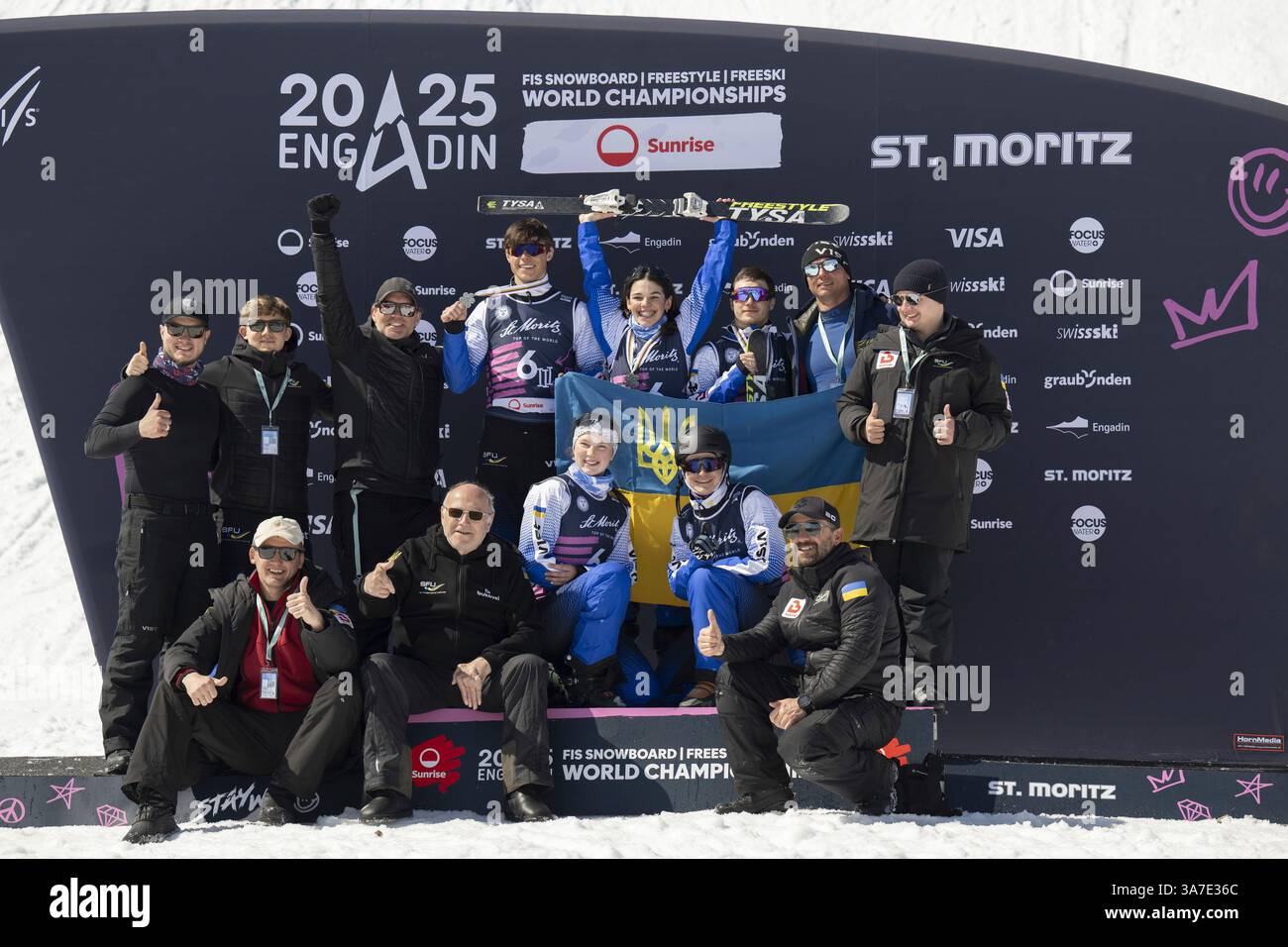 Silver medal team Ukraine pose in the podium of the Aerials Mixed Team ...