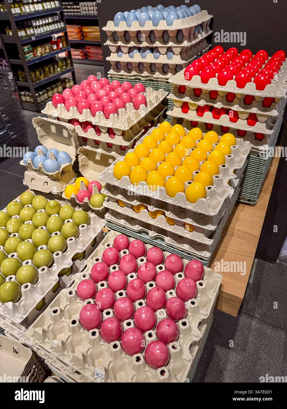 Colorful Dyed Eggs in Cartons at a Gourmet Store Display Stock Photo ...
