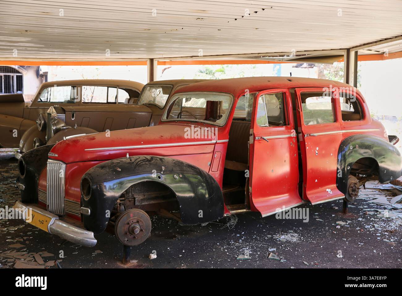 Vandalized vintage luxury cars are parked in a hangar at the Republican ...