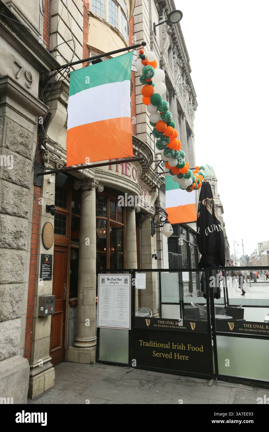 Dublin, Ireland - 21st March 2025 - Irish tricolour flags hang from ...