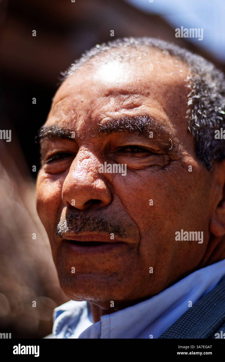 MARRAKECH, MOROCCO - MAY 20, 2024 local mans face in the souk market in ...