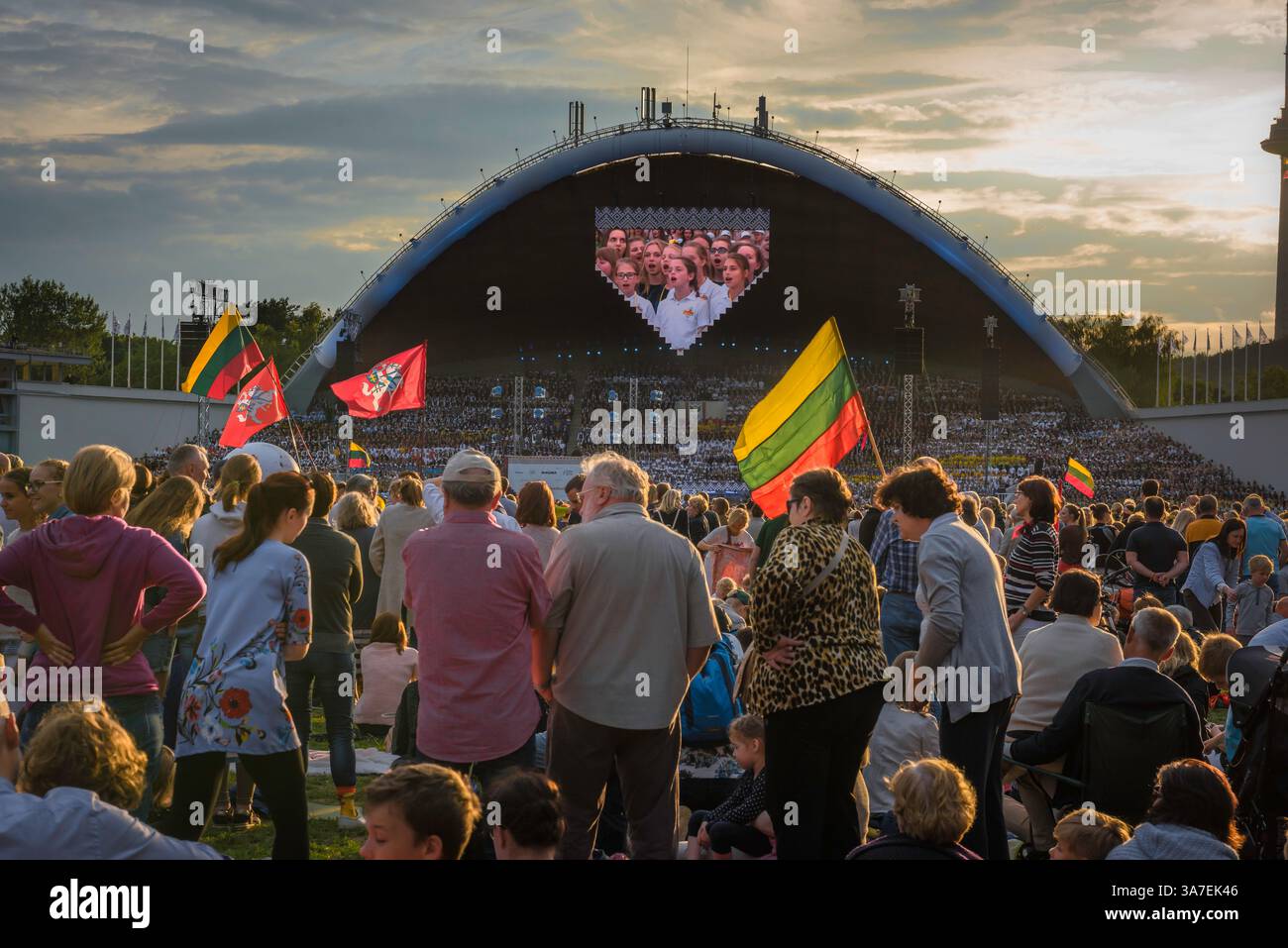 Lithuania people, view of people gathered at dusk in front of the ...