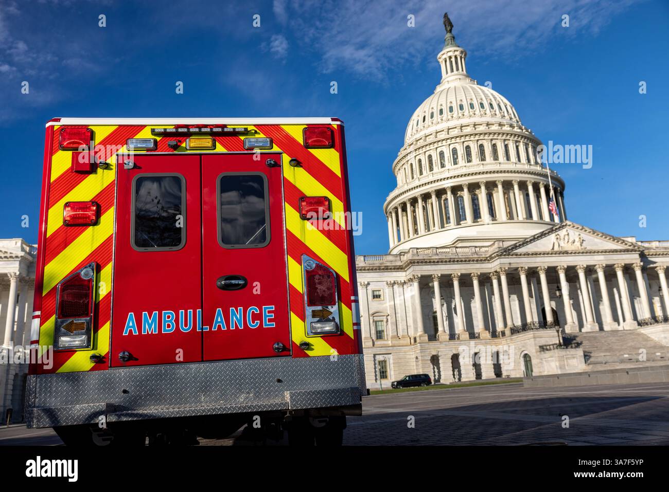 An ambulance, ready for emergency, parked in front of the United States ...