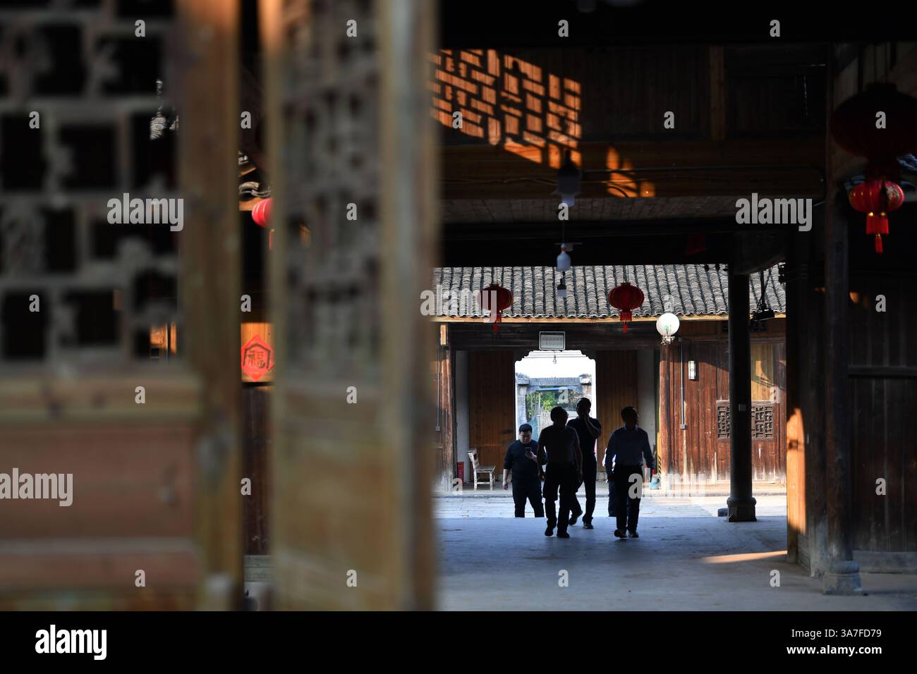 Yongzhou, China's Hunan Province. 25th Mar, 2025. People visit the Zhou ...