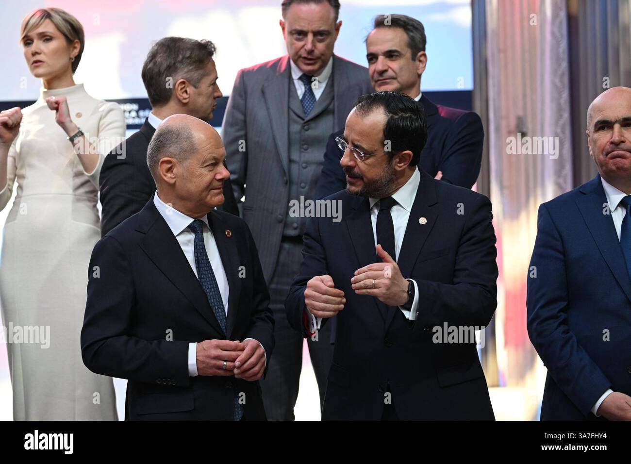 Paris, France. 27th Mar, 2025. Germany's Chancellor Olaf Scholz speaks ...