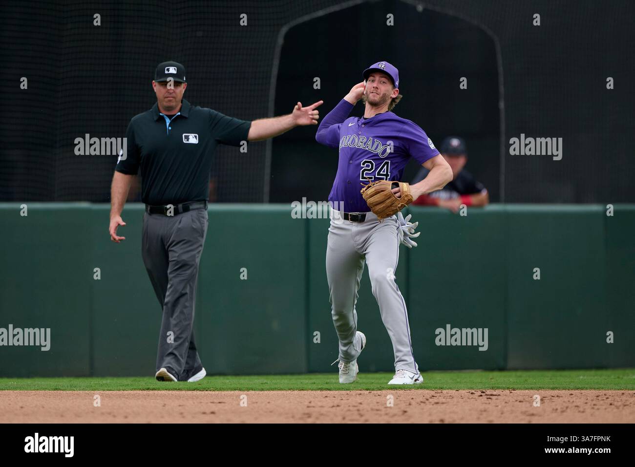 Colorado Rockies third baseman Ryan McMahon (24) throws to first base ...