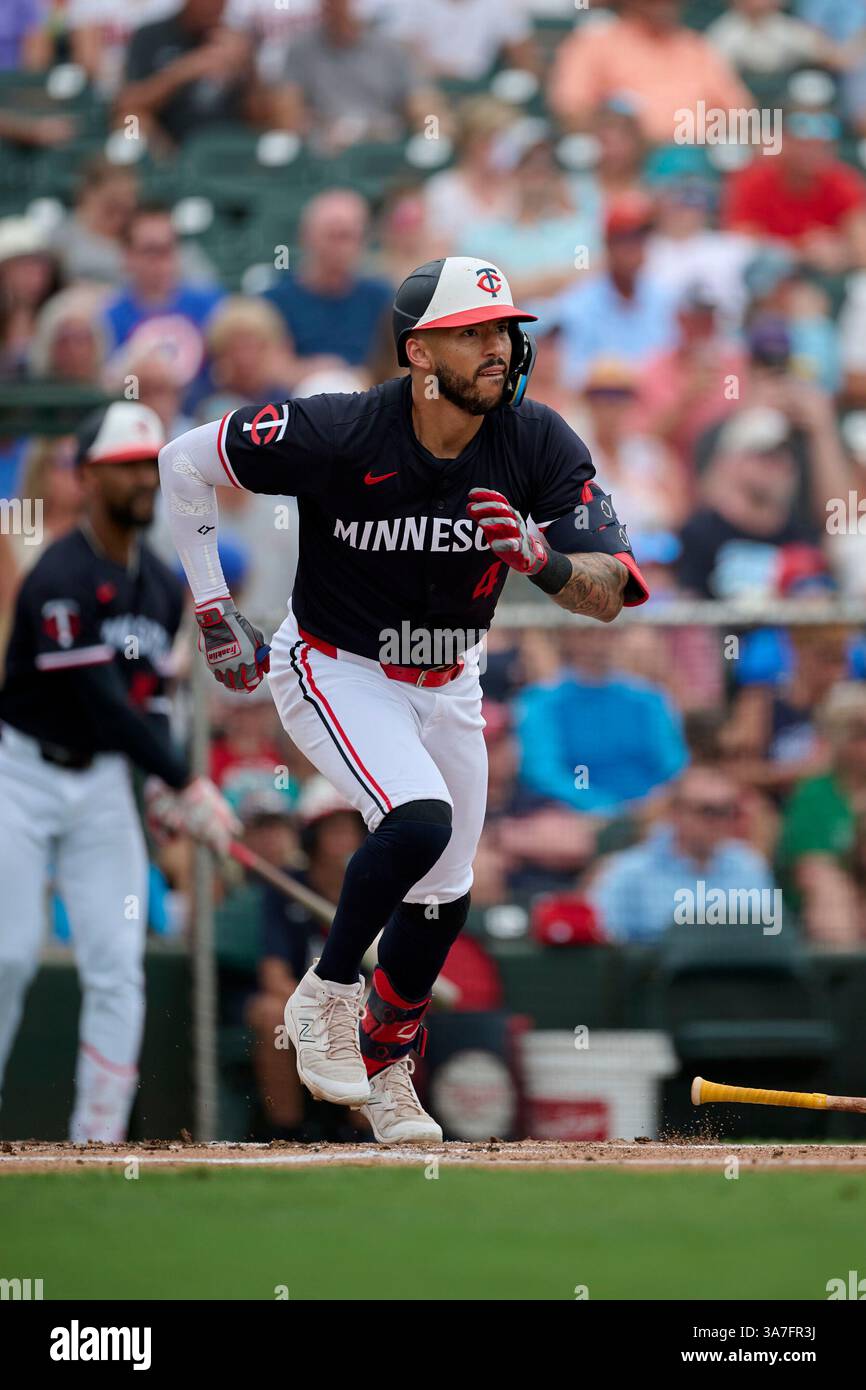 Minnesota Twins Carlos Correa (4) runs to first base after hitting a ...