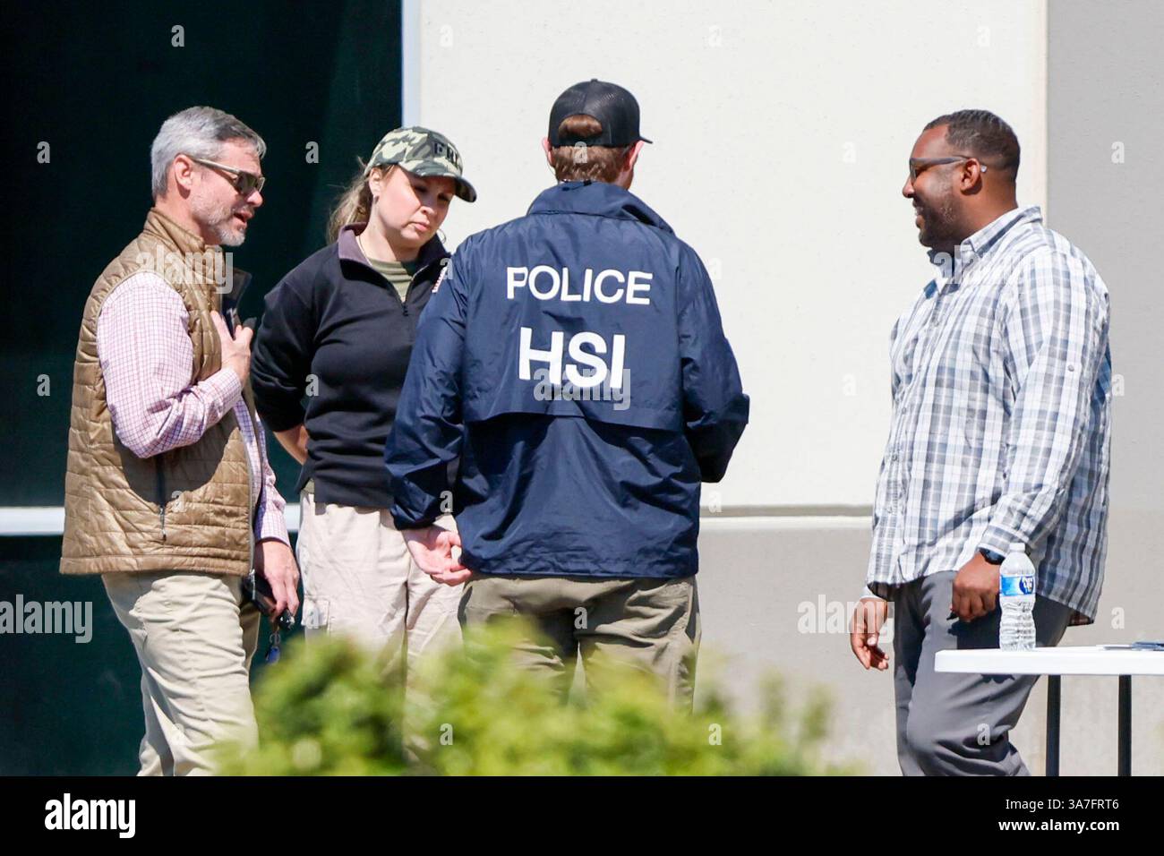 Agents from Homeland Security Investigations, the FBI, and the Sheriff ...
