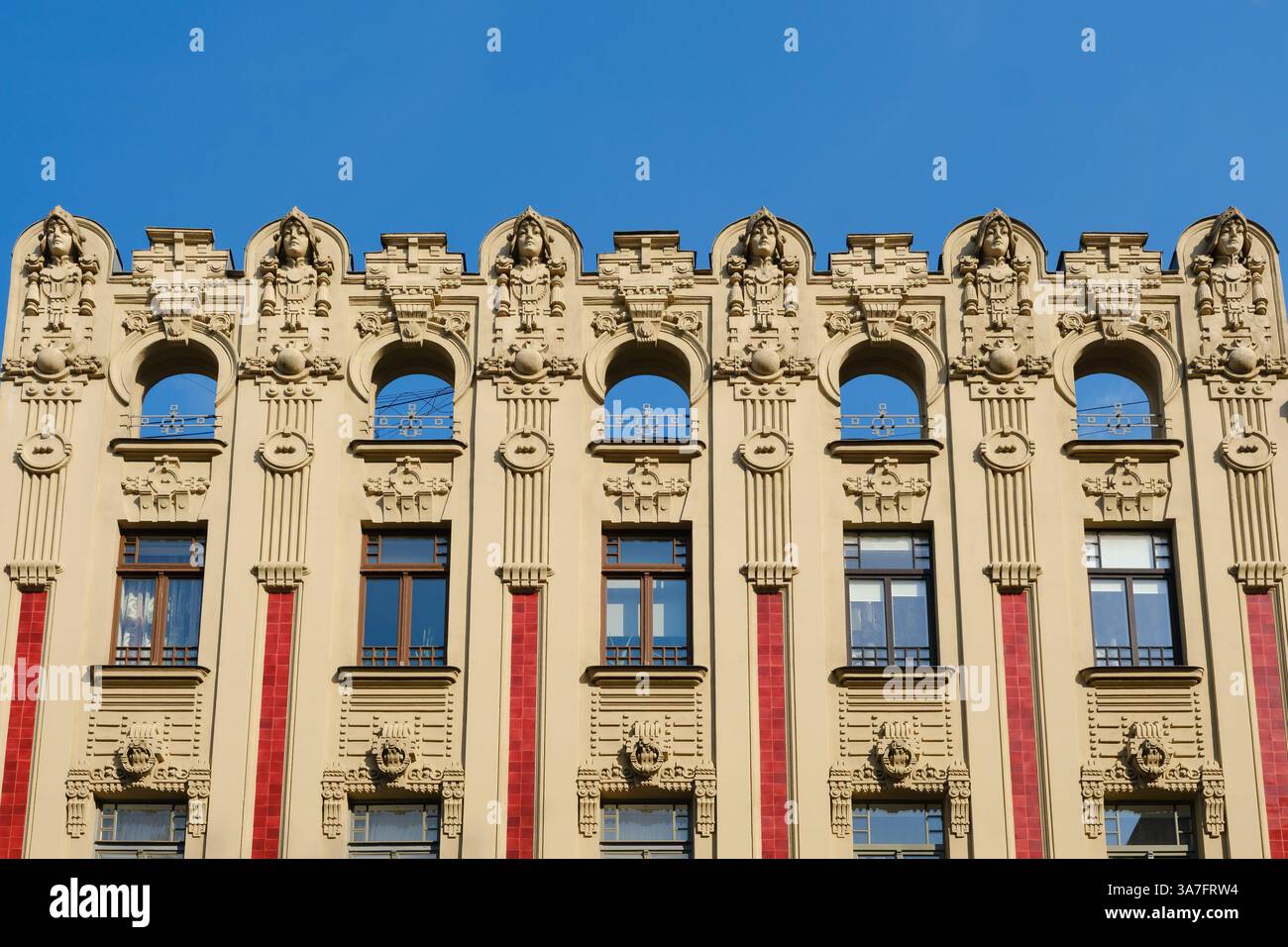 The ornate facade of an old historic Art Nouveau building in Riga ...