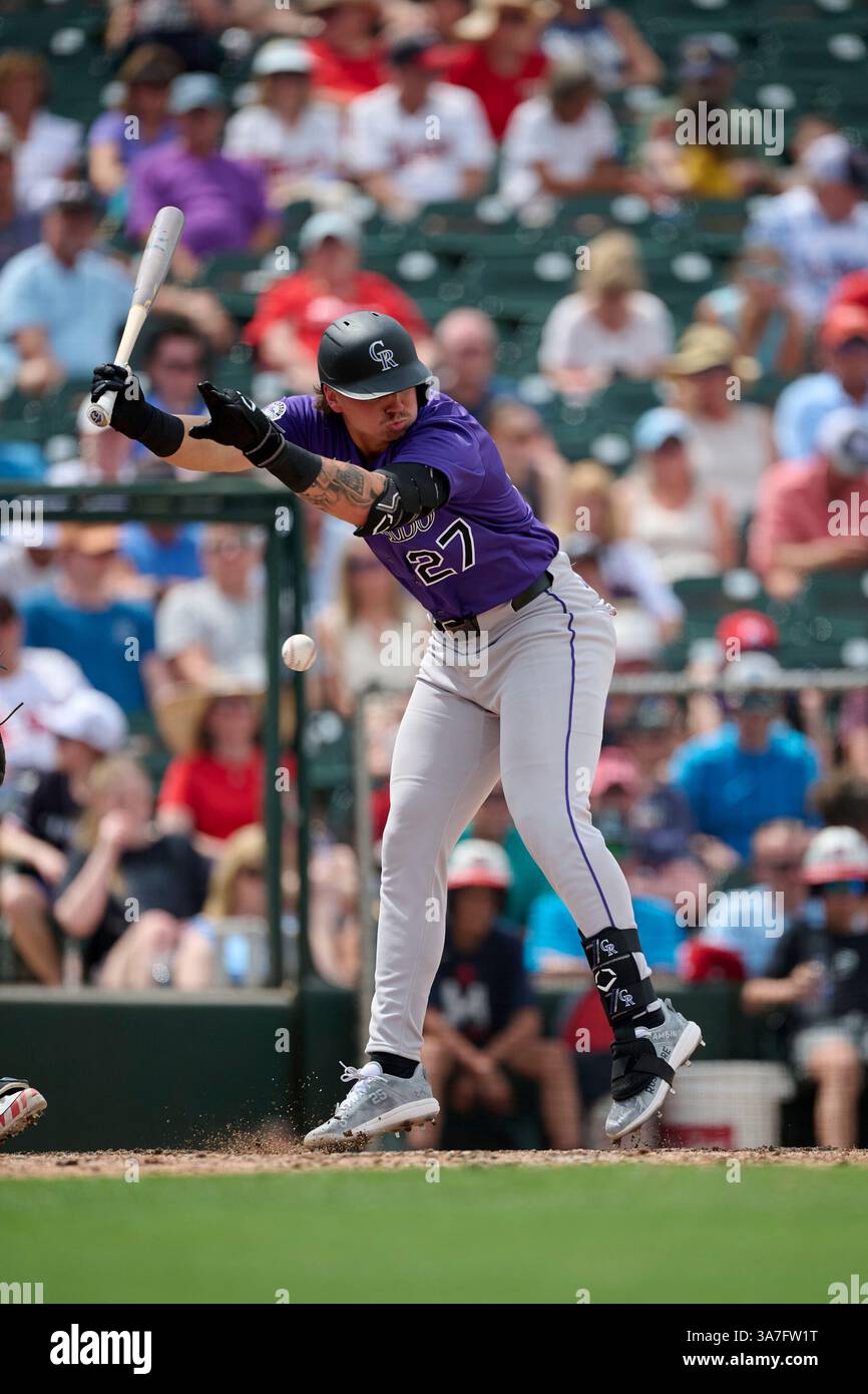 Colorado Rockies Jordan Beck (27) hit by a pitch during an MLB Spring ...