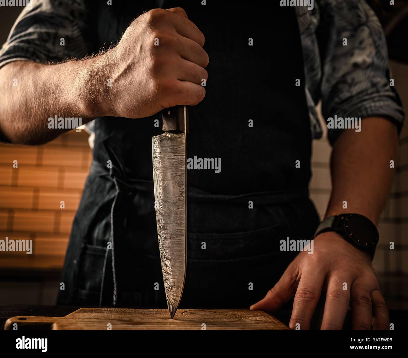 Chief holding big knife hi-res stock photography and images - Alamy