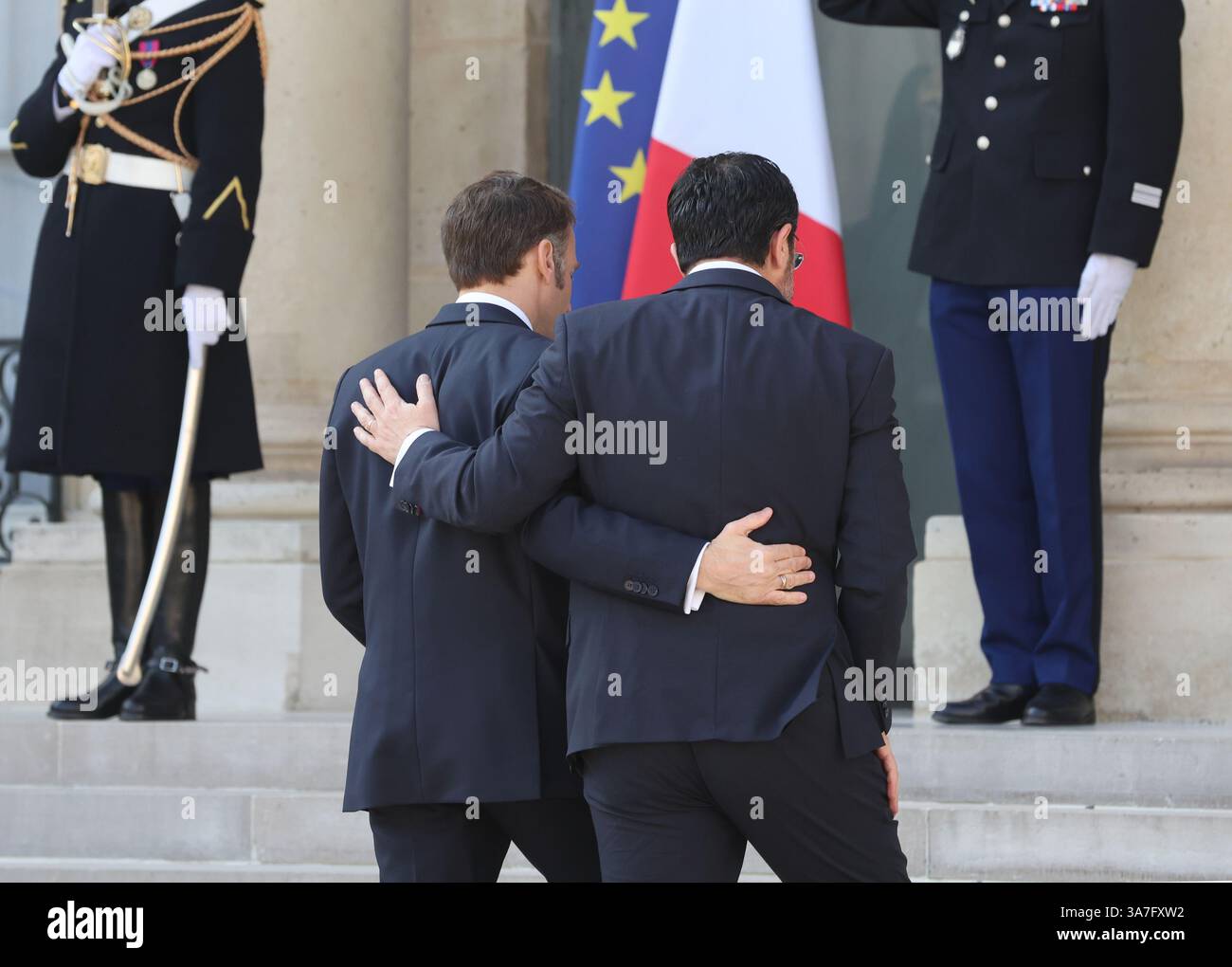 Paris, France. 27th Mar, 2025. French President Emmanuel Macron greets ...