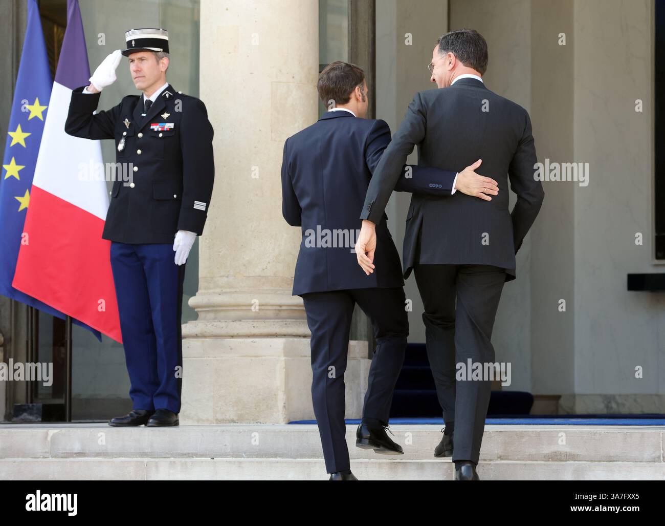 Paris, France. 27th Mar, 2025. French President Emmanuel Macron greets ...