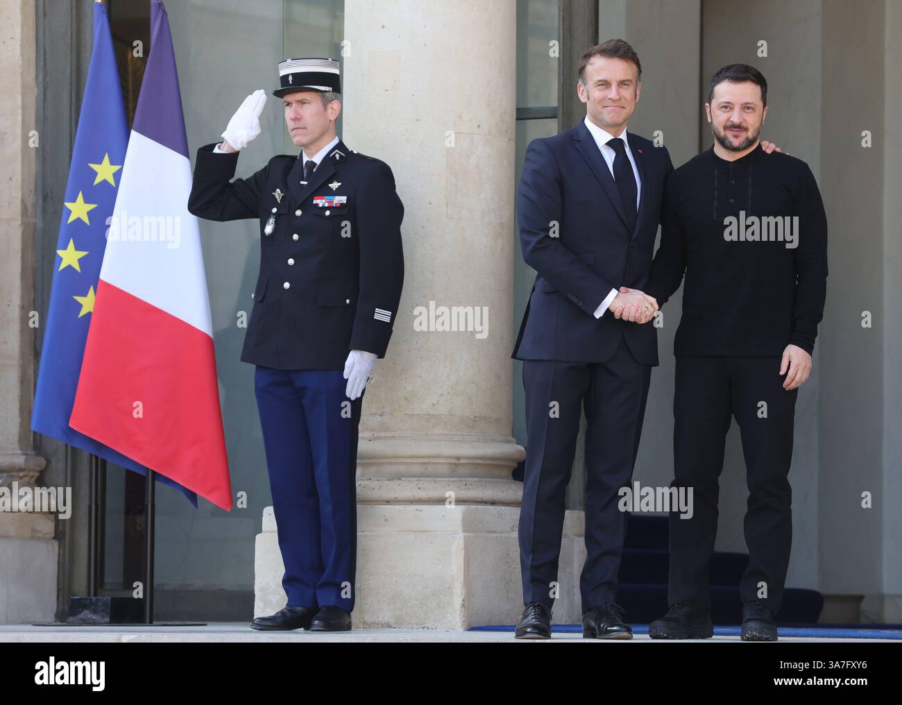 French President Emmanuel greets Ukrainian President Volodymyr Zelensky ...