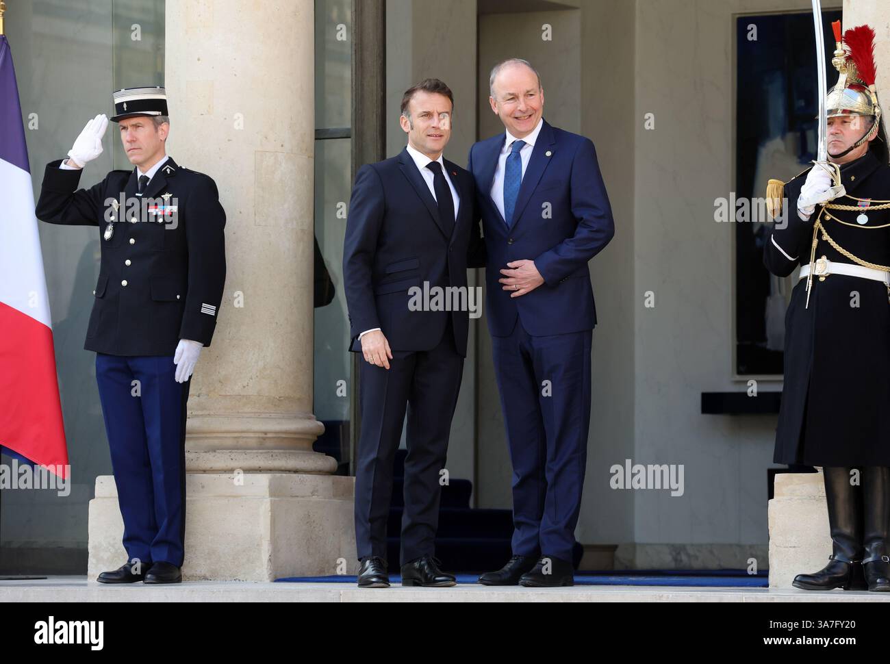 Paris, France. 27th Mar, 2025. French President Emmanuel Macron greets ...