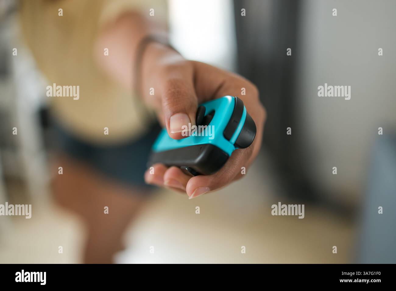 Hands using game controller. Playing video games close-up Stock Photo ...