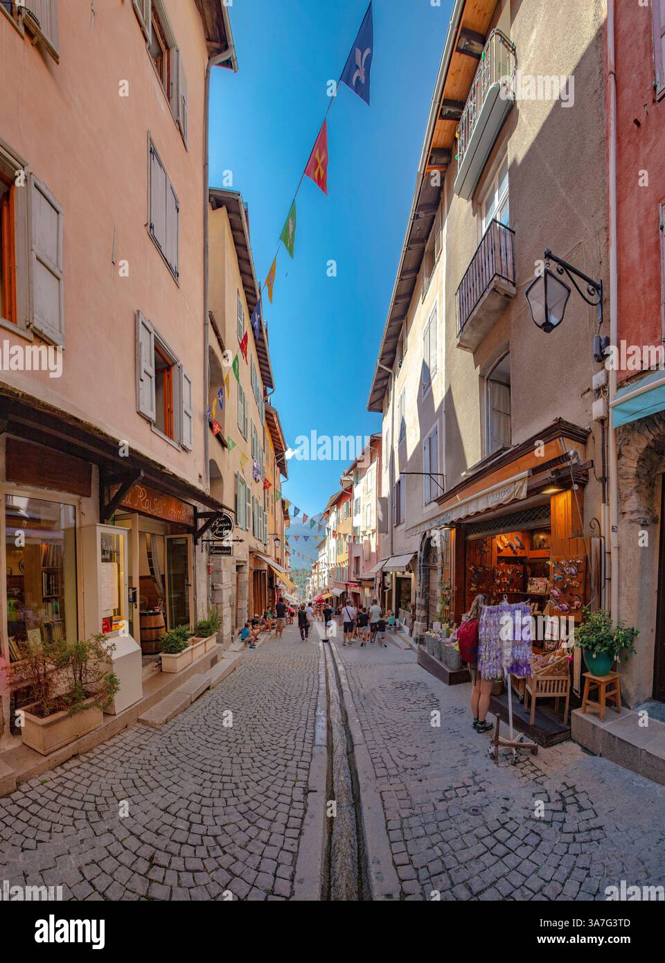 Grande Rue, the shopping street with an open drain in the middle of the ...