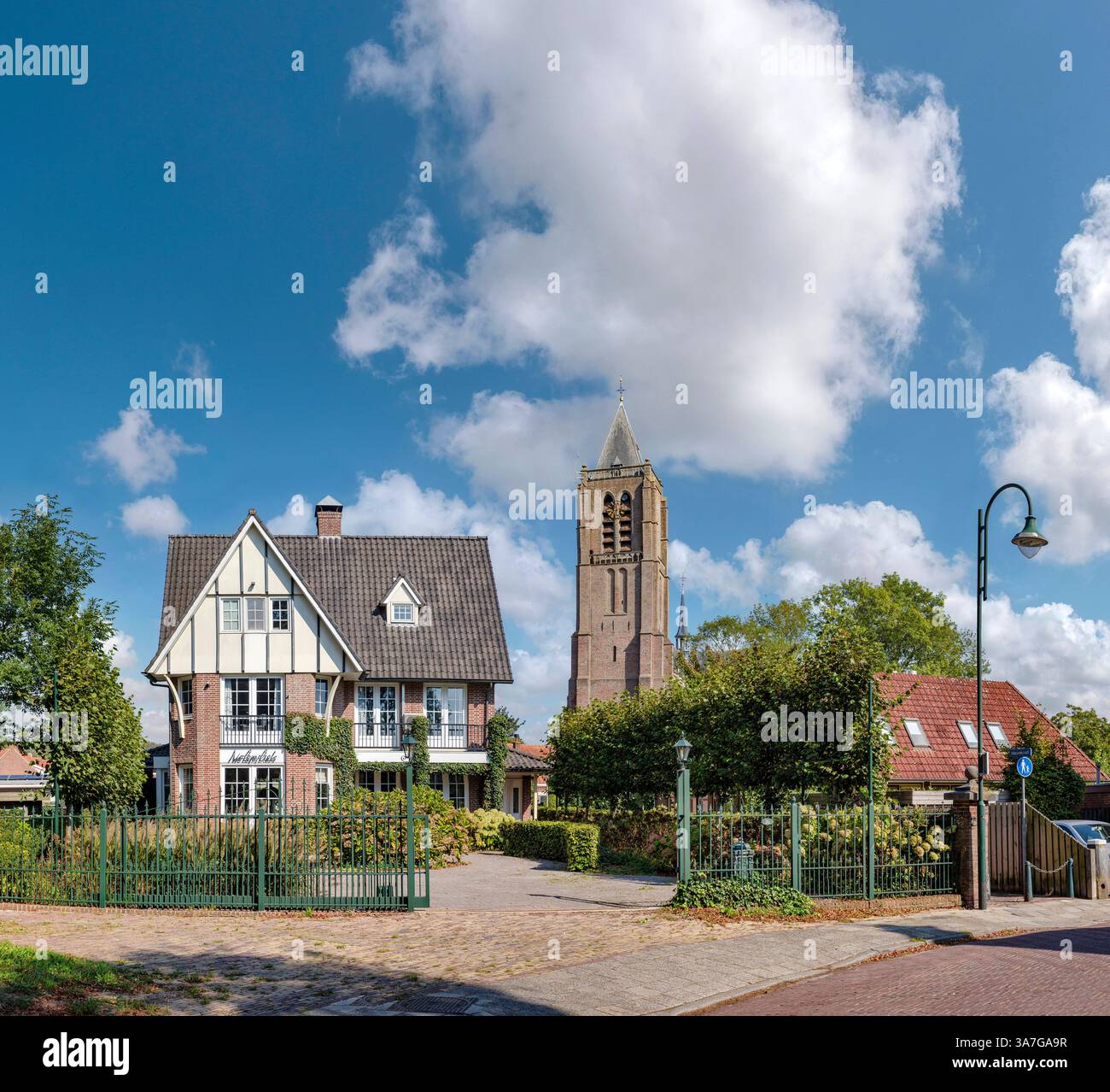 The Great Church with a special house, Tholen, Zeeland, Netherlands ...