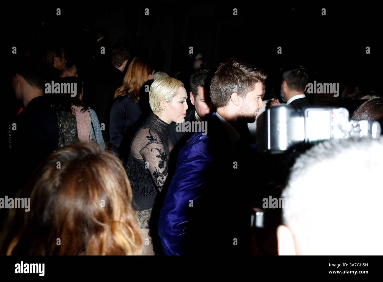Actors Miley Cyrus and Patrick Schwarzenegger arrive at the Tom Ford ...