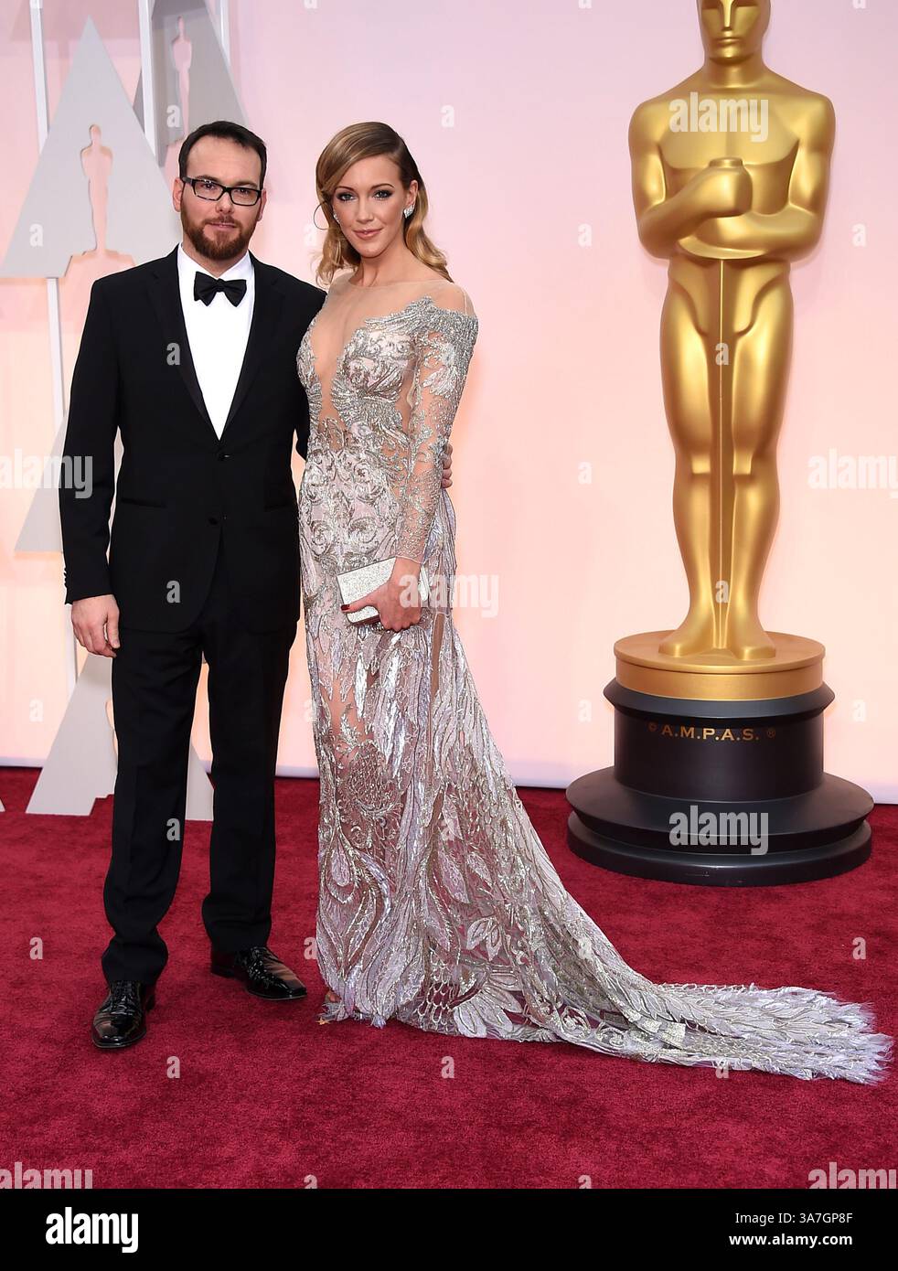 Dana Brunetti and Katie Cassidy at the 87th Annual Academy Awards aka ...